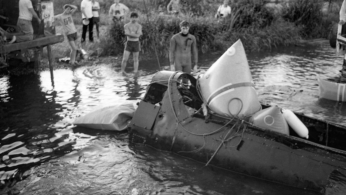 Rare WWII Helldiver takes to skies after decades in Lake Washington ...