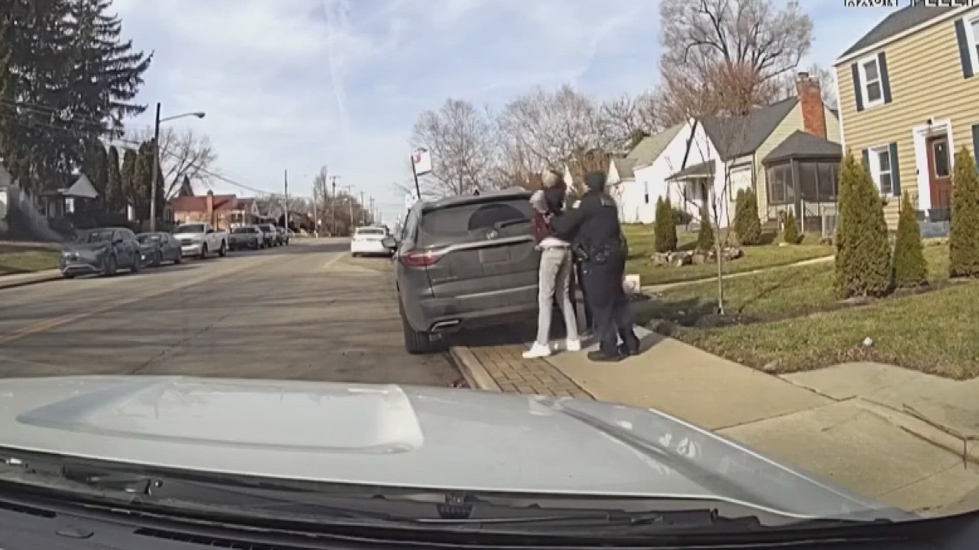 Columbus police arrest man holding child, bodycam video sparks debate ...