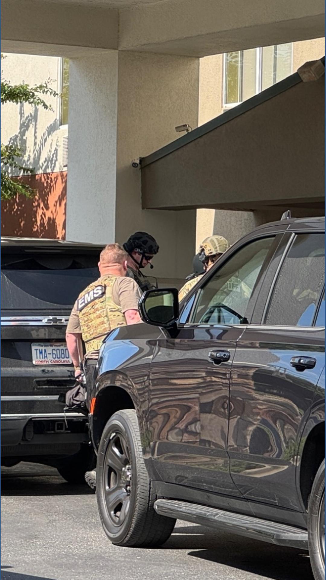Police in standoff with armed person linked to missing persons case ...