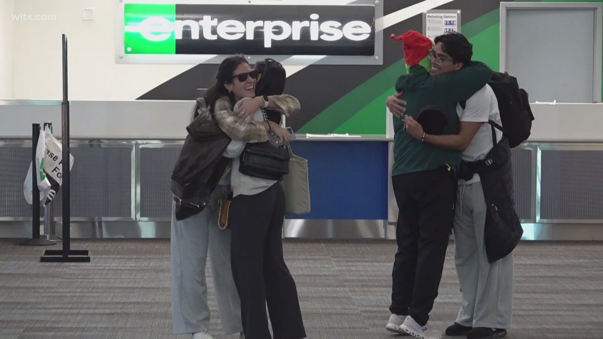 Families, friends reunite at CAE for the holidays | wltx.com