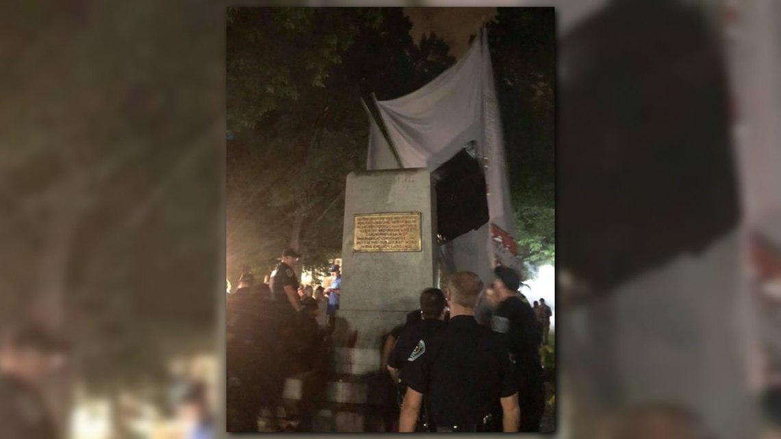 PHOTOS | 'Silent Sam' Torn Down During Protests On UNC's Campus | wltx.com