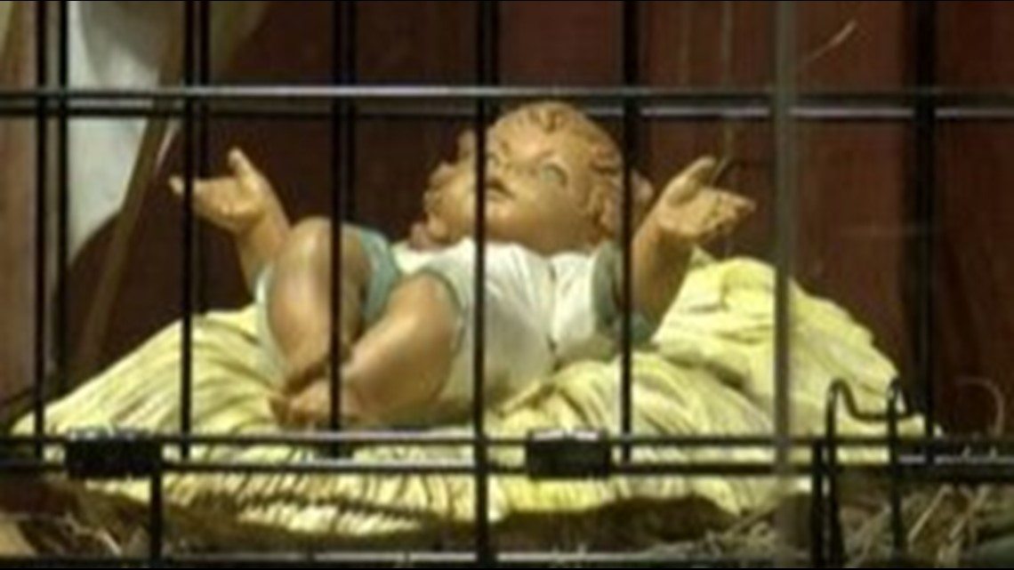 Baby Jesus placed in cage in church's immigration-themed nativity scene ...