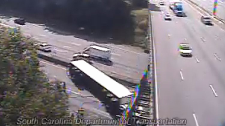 I-20 at Malfunction Junction cleared after overturned tractor trailer ...