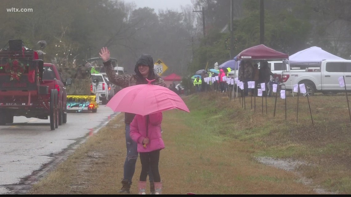 Boykin Christmas Parade sloshes through December downpour | wltx.com