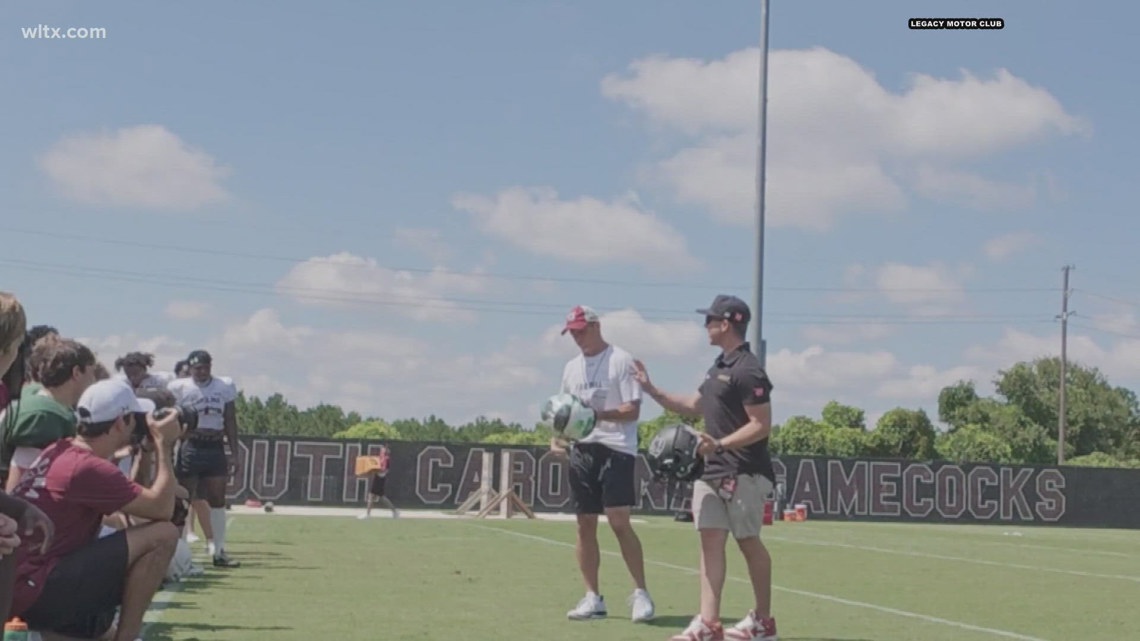 A helmet swap involving Shane Beamer and Cup Series driver John Hunter Nemechek | wltx.com