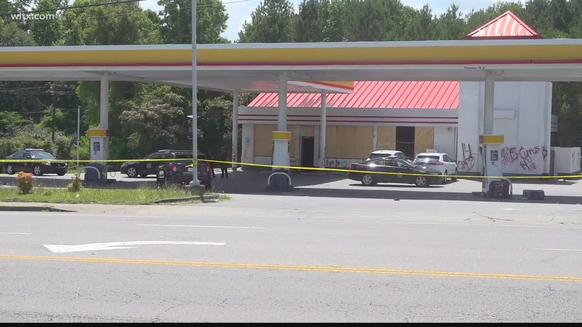 There were multiple vehicles outside the Shell station on Parklane Road ...