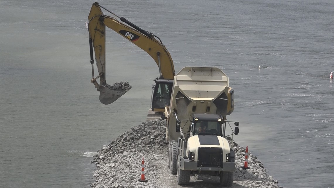 Rocks are moving to build the coffer dams on the Congaree river | wltx.com