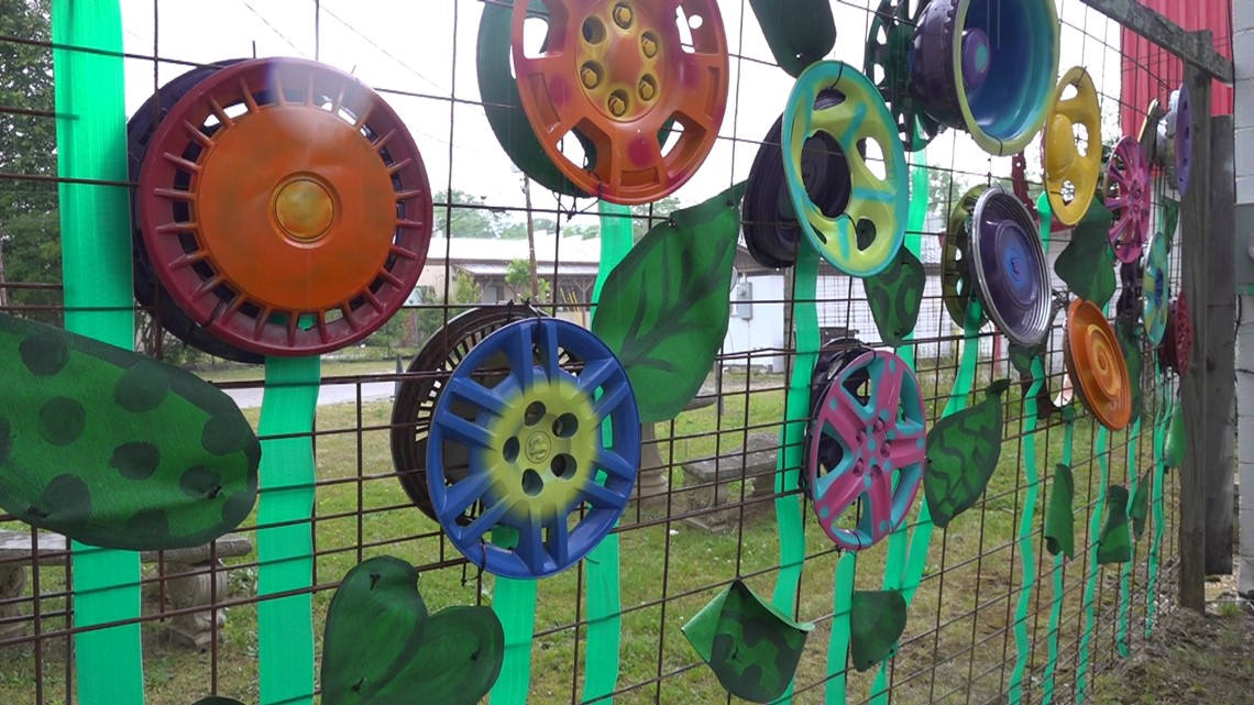 Bishopville artist beautifying downtown with hubcap garden art | wltx.com